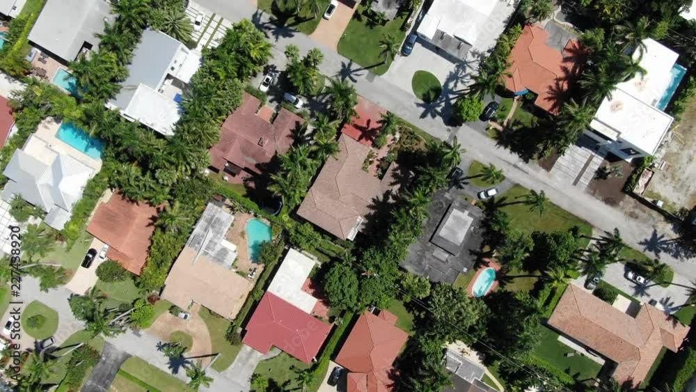Flying over suburban houses in Miami Stock Video | Adobe Stock