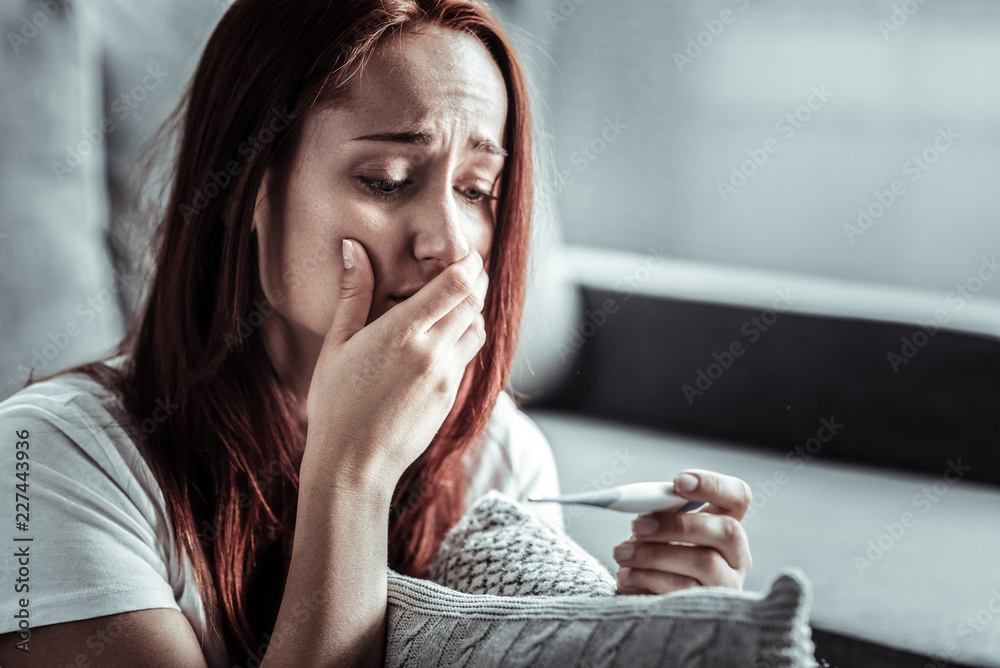 Cannot believe. Upset female wrinkling forehead and raising eyebrows ...