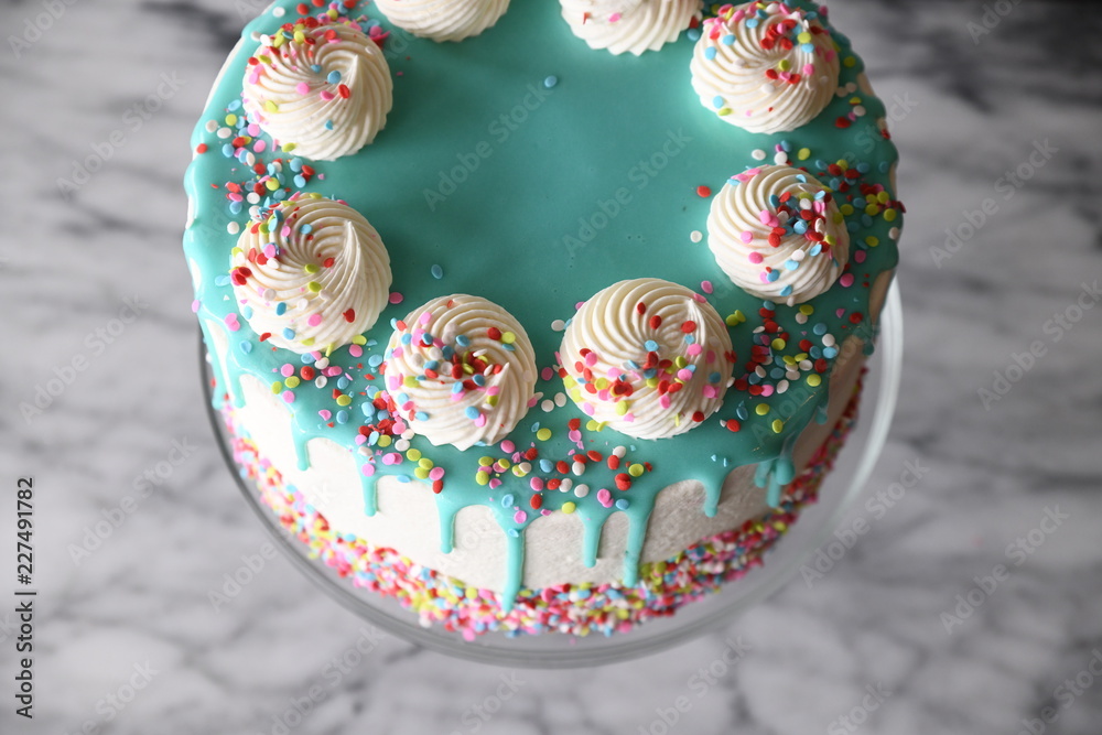 Pastel cake with sprinkles Stock Photo | Adobe Stock