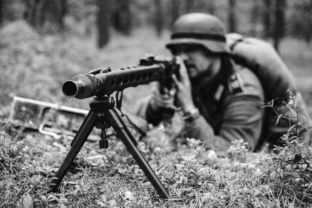 Hidden German Wehrmacht Soldier Aiming A Machine Gun At Enemy Fr Stock ...