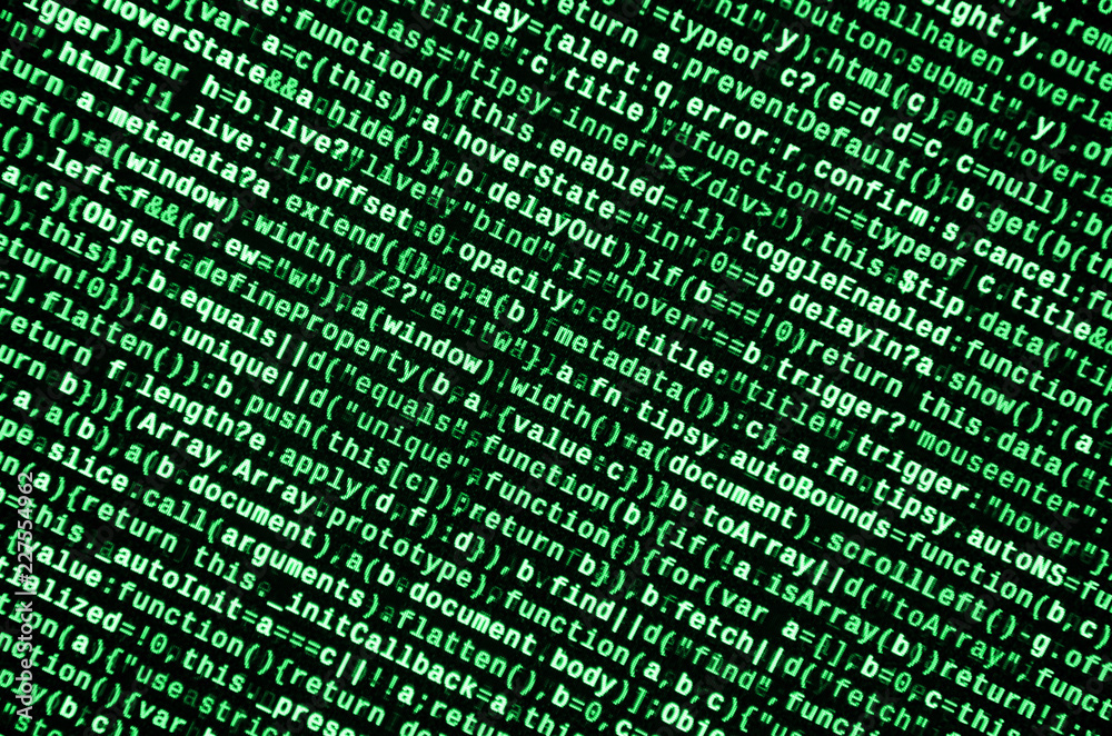 Writing programming code on laptop. Digital binary data on computer ...