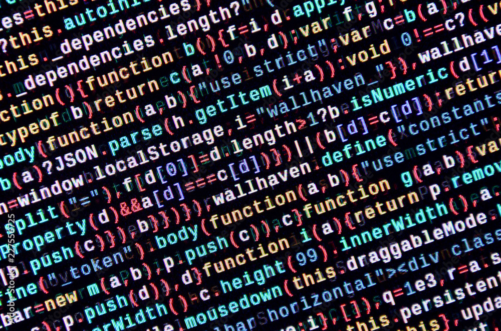 Writing programming code on laptop. Digital binary data on computer screen Stock Photo | Adobe Stock