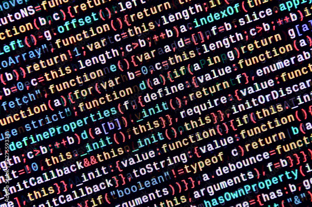Writing programming code on laptop. Digital binary data on computer ...