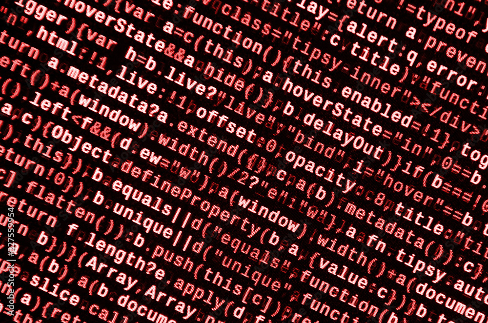 Writing programming code on laptop. Digital binary data on computer screen Stock Photo | Adobe Stock
