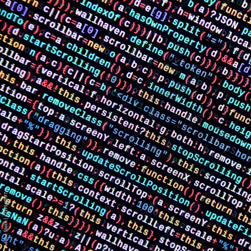 Writing programming code on laptop. Digital binary data on computer screen Stock Photo | Adobe Stock