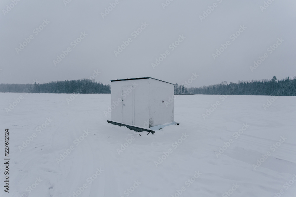 Fish house on frozen lake. Stock Photo | Adobe Stock