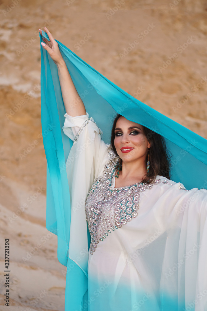 Eastern beauty in suit for performance of national dance Khaleeji ...