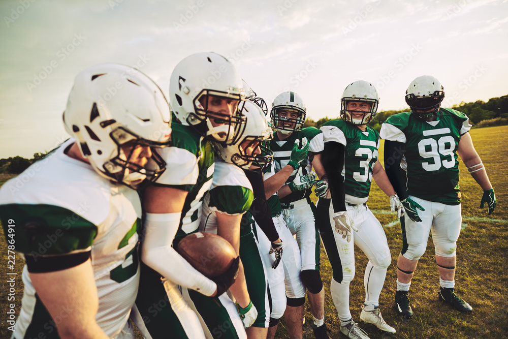 Laughing American football players having fun together during pr Stock ...