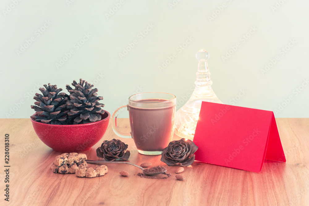 Christmas scene with a cup of hot cocoa, chocolate chip cookies and ...