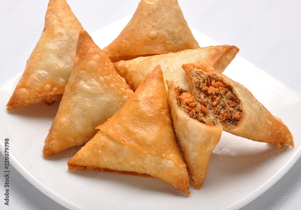 Chicken Samosa, also known as memoni samosa stuffed with spicy mashed ...