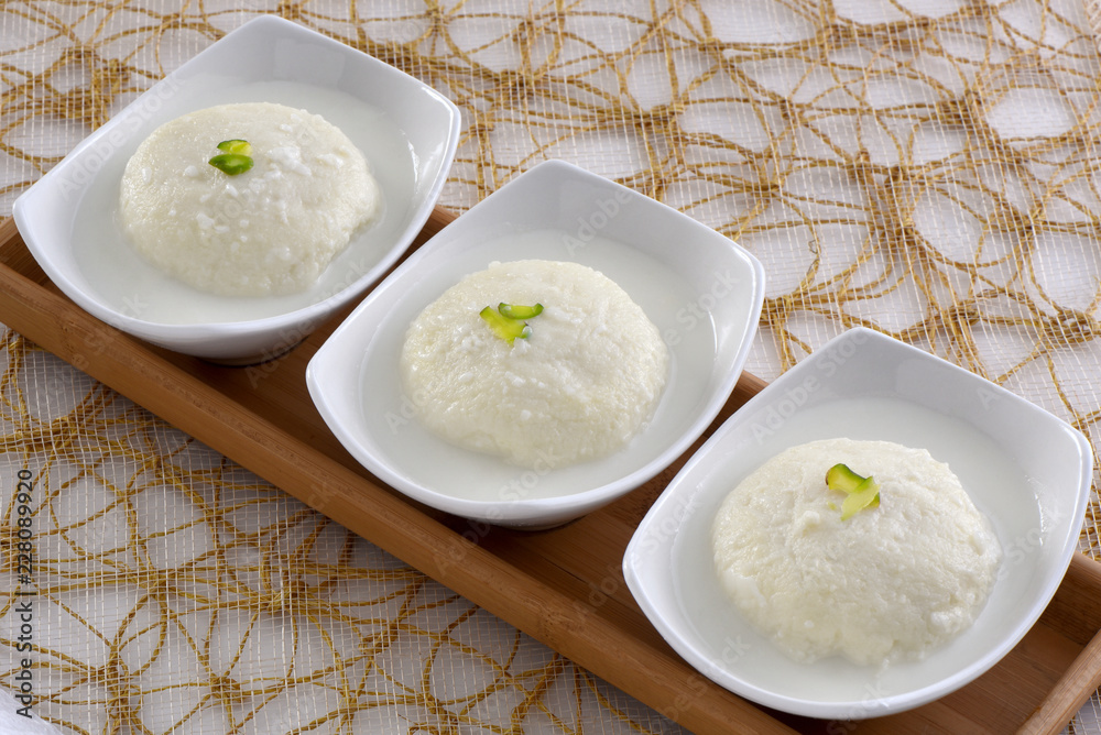 Rasmalai, delicious cottage cheese patty in sweet and thick milk syrup ...