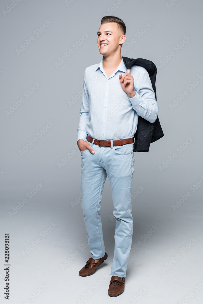 Full height of man in business clothes with jacket in hands isolated on ...
