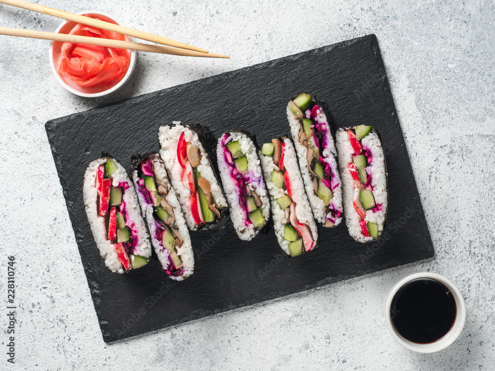 Vegan sushi sandwich onigirazu with mushrooms and vegetables. Healthy ...
