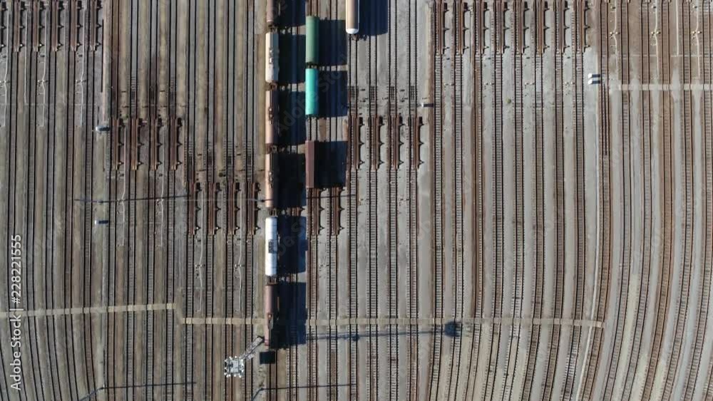 Aerial top down footage of classification yard is railroad ...