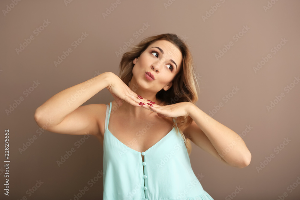 Portrait of beautiful young woman on color background Stock Photo ...