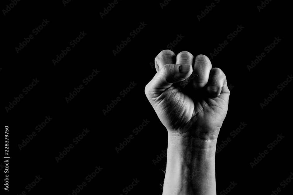 Fist Up. Concept of Power, Teamwork and Unity. Black and white, copy ...