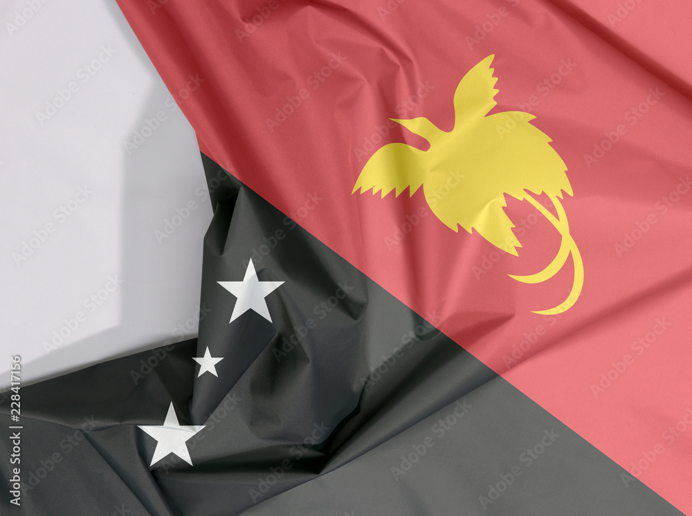 Papua New Guinea fabric flag crepe and crease with white space ...