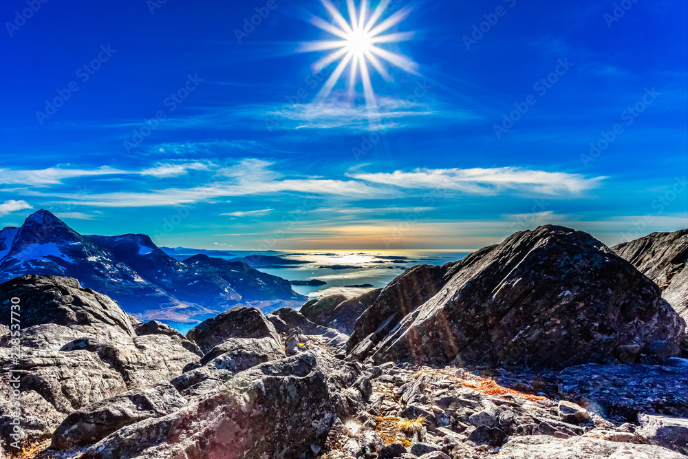 Polar arctic greenlandic sun in its zenith over the fjord and m Stock ...