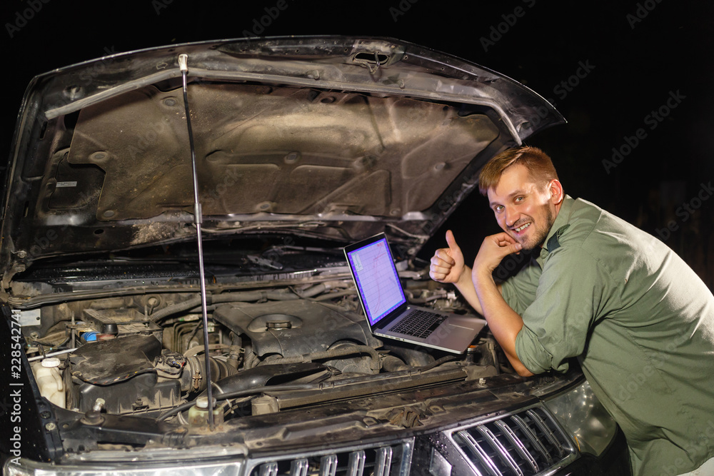The mechanic in uniform shows that the engine is all right. Raised ...
