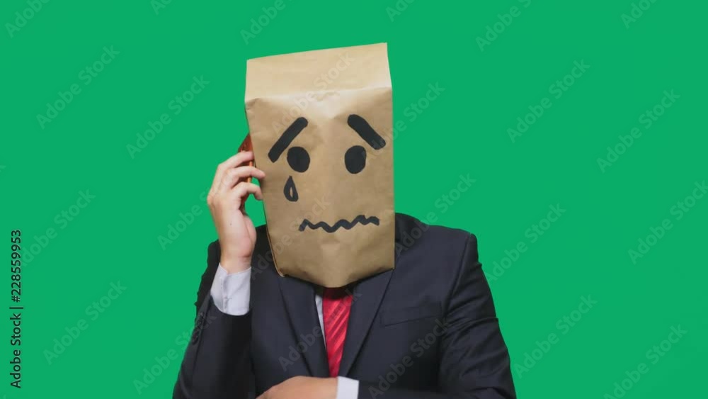 concept of emotion, gestures. a man with a package on his head, with a ...