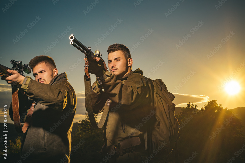 Hunting gun. Hunter aiming rifle in forest. Calibers of hunting rifles ...