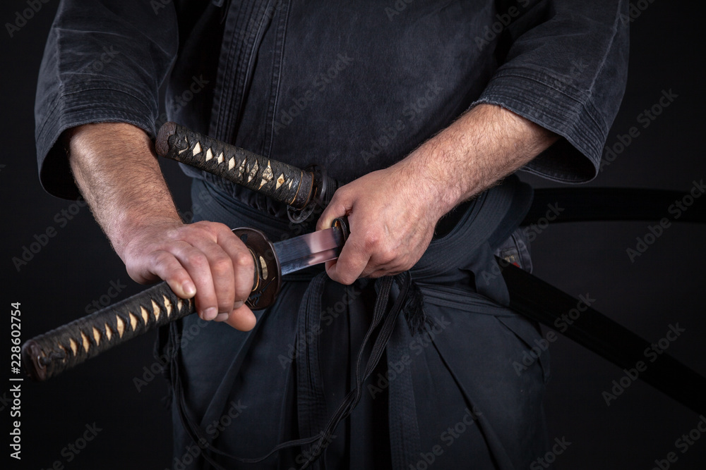 Samurai handle a japanese katana sword and a katana on a tatami Stock ...