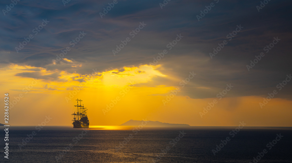 Old ship silhouette in sunset scenery Stock Photo | Adobe Stock