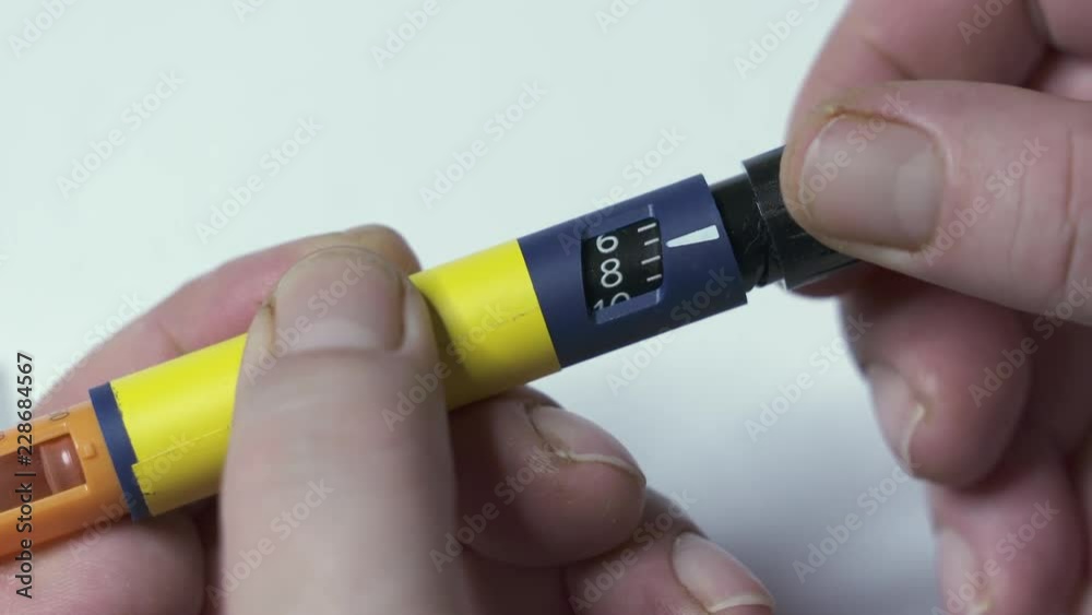 Insulin therapy routine. Patient with diabetes using diabetic insulin ...