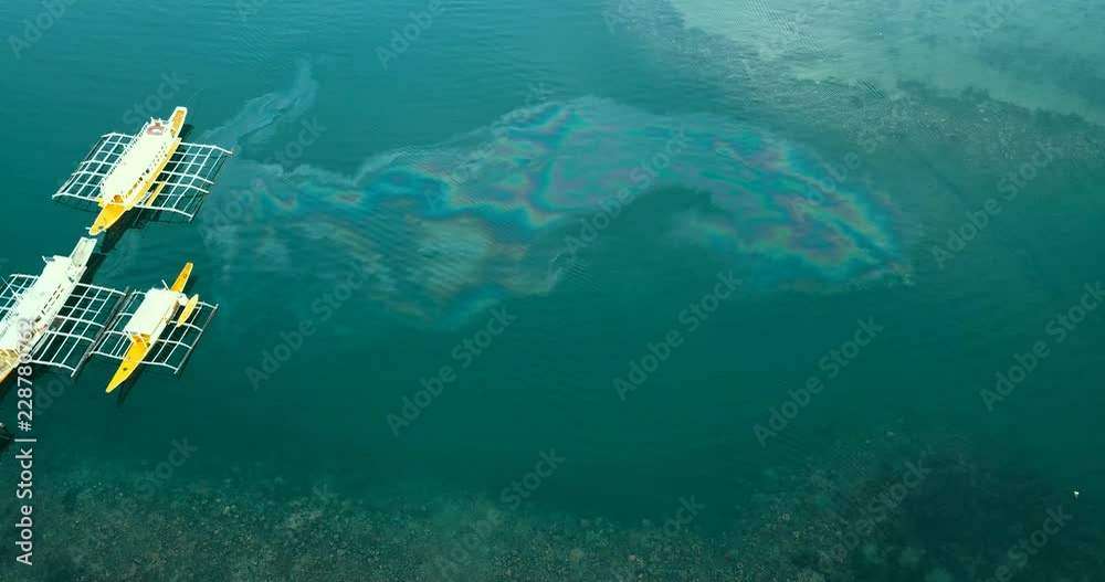 Marine pollution ‚Äì oil spill in beautiful tropical Coron Bay, Palawan ...