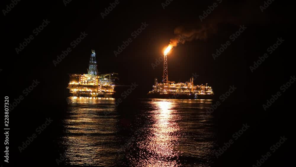 FPSO tanker vessel near Oil platform Rig. Offshore oil and gas industry ...