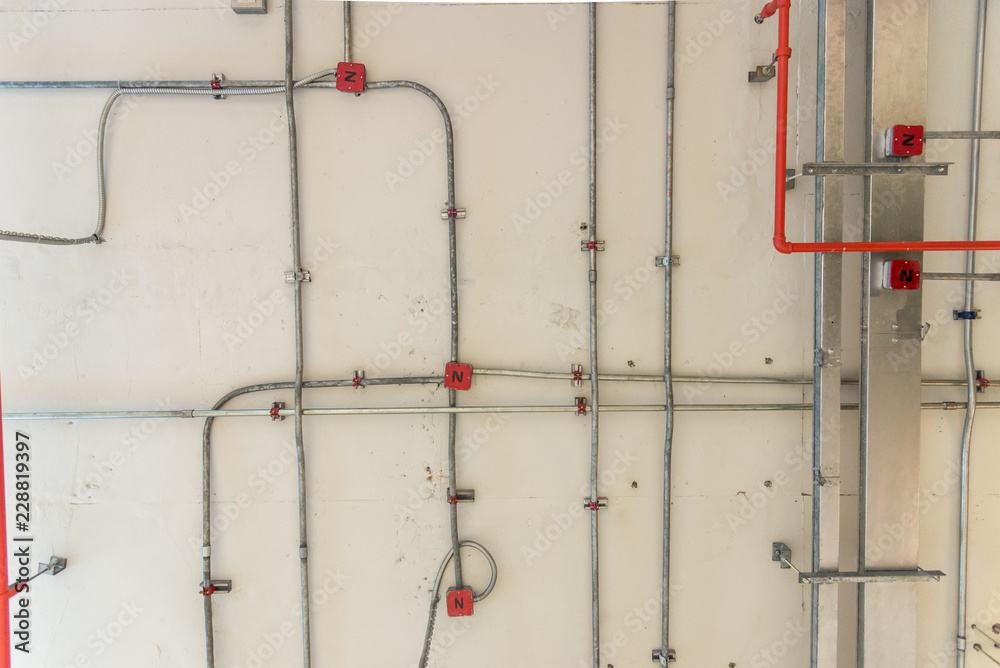 power line in running conduit tube on ceiling, galvanized steel conduit ...