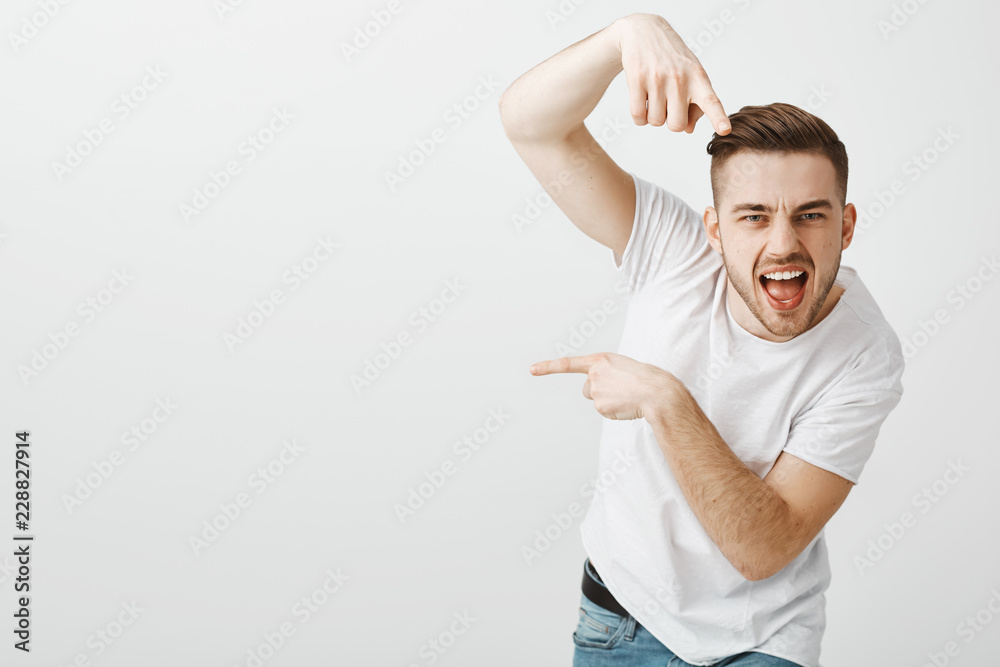 You go there. Portrait of stylish confident and emotive macho man with ...