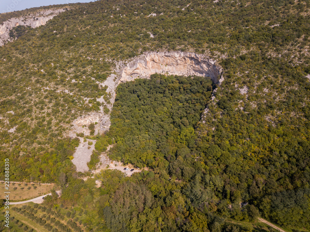 The Osp (Ospo) is a village close to Trieste just below a huge rock ...