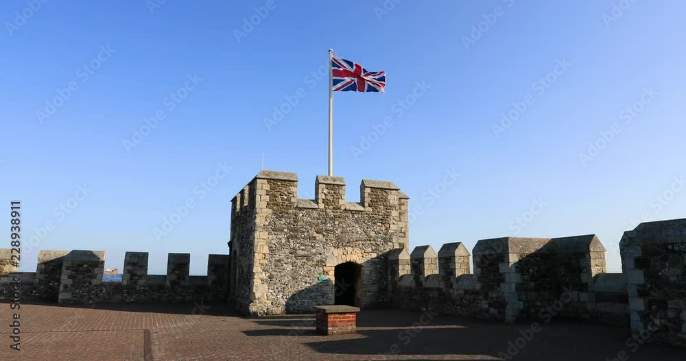 Dover Castle British flag on tower keep. Dover Castle a medieval fort ...