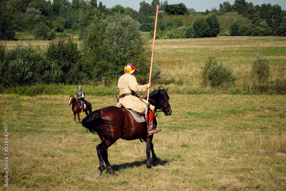 Knight tournament. Medieval armored riders with lances on horses ...