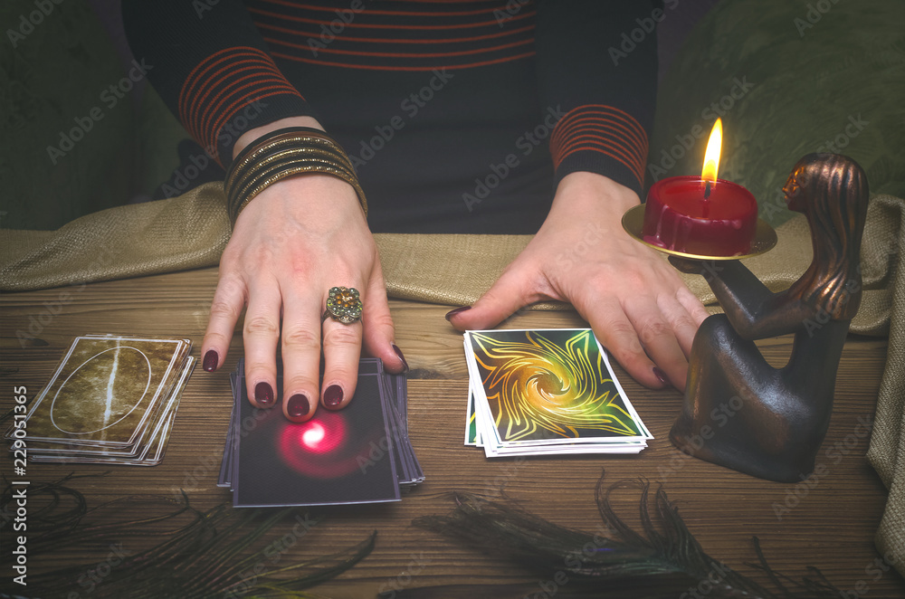 Tarot cards on fortune teller desk table background. Futune reading ...