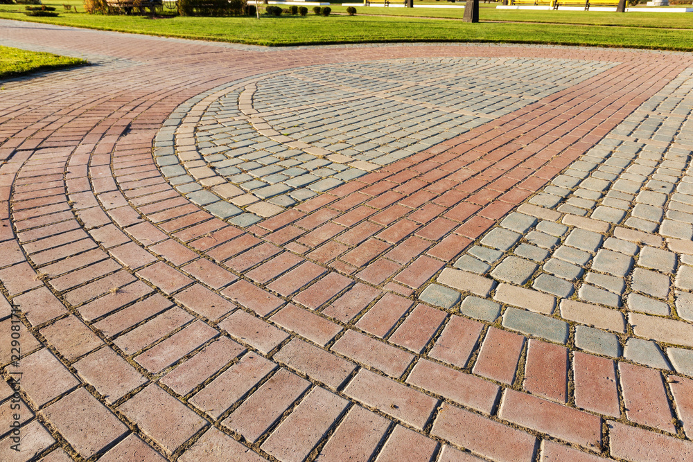 Damaged asphalt road with potholes, caused by freeze-thaw cycles in ...