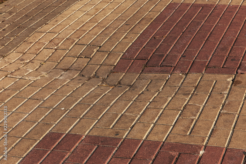 Damaged asphalt road with potholes, caused by freeze-thaw cycles in ...