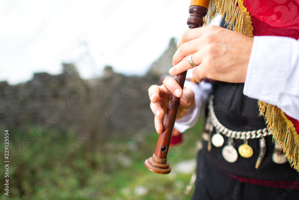 Bagpipe player detail. With traditional dress Stock Photo | Adobe Stock