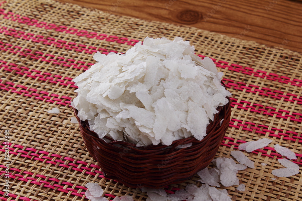 uncooked puffed rice flakes poha in basket for indian gujarati ...