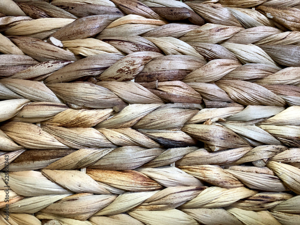 braided basket weave closeup with textured pattern of woven dried plant ...