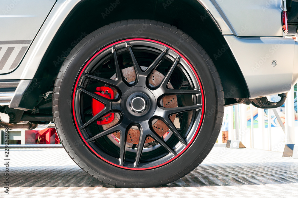 Side view of modern car with rubber tire on wheel rim Stock Photo ...