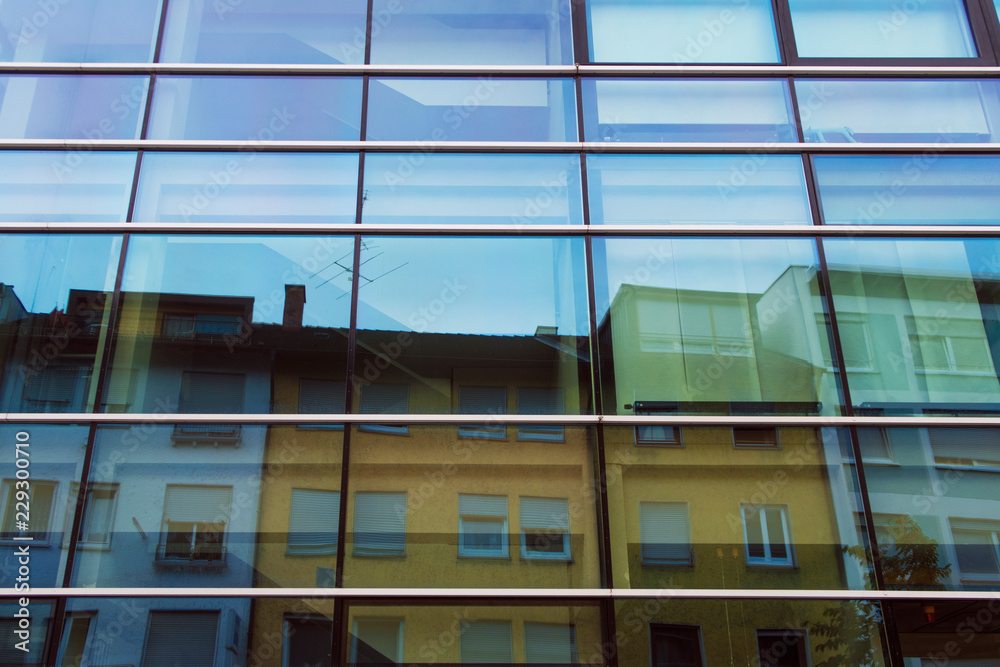 reflection of old buildings in new building glass Stock Photo | Adobe Stock