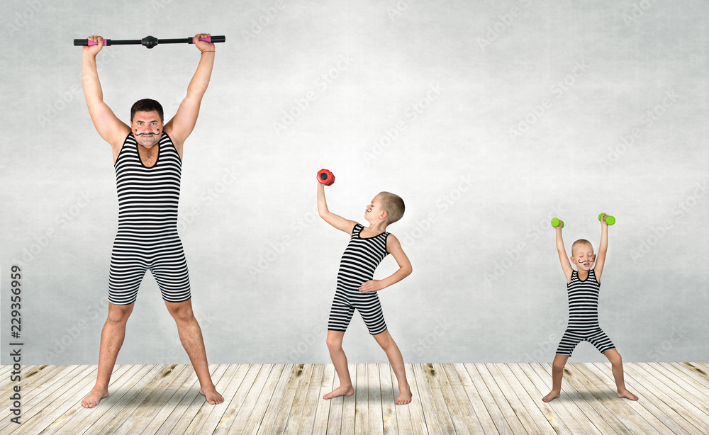 Family of strongman. The father of two sons in vintage costume of ...