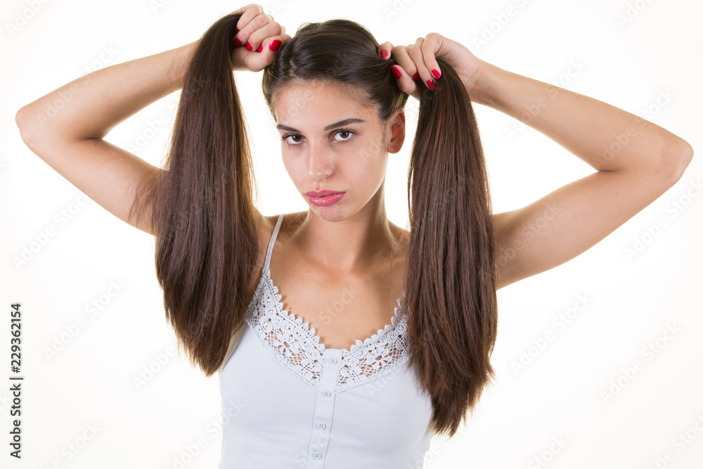 pretty young pigtails smiling woman make hair in pig tails foto de ...