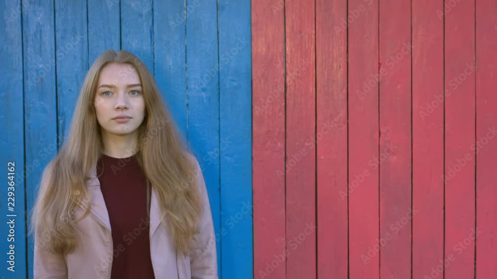 Vidéo Stock Girl on colourful wooden eco background. Dreamy mood. Girl ...
