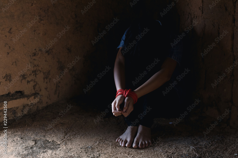 Kidnapped little girl tied with rope.Abused and tortured concept. Human ...