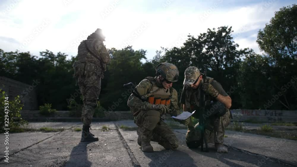 Vídeo do Stock: Commander of rangers paving the route on map during ...