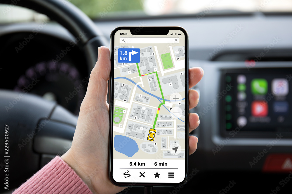 women hand holding phone with app navigation map on screen Stock Photo ...