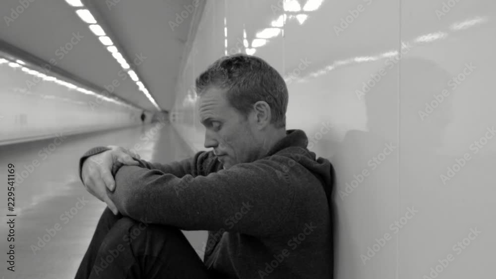 Miserable jobless young man crying Drug addict Homeless in depression ...